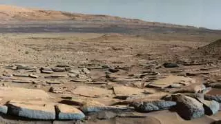 Martian ám fluttu pebbles fyrir tugum kílómetra vegna mikils flæði